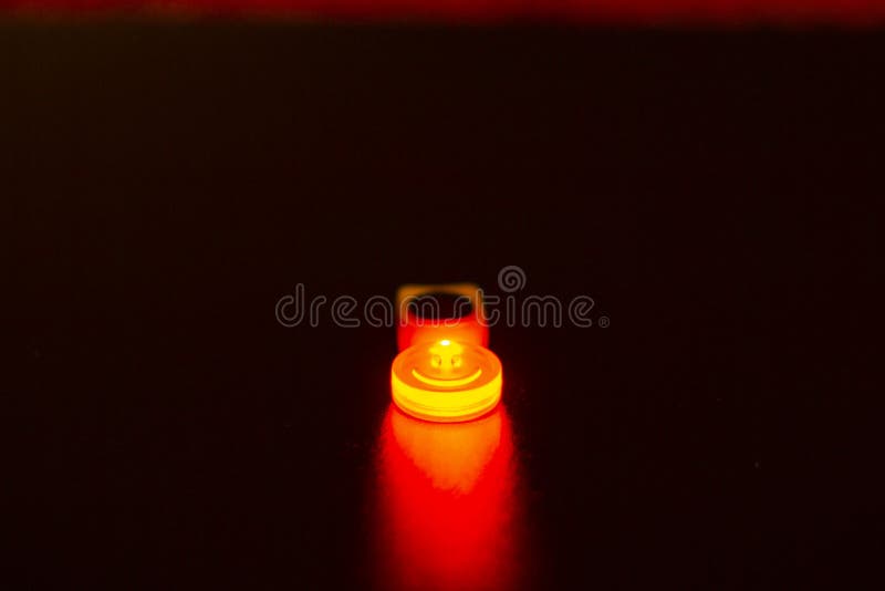 Red LED Flashlight Keychain in the Form of a Smile Stock Photo - Image ...