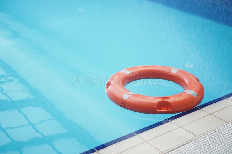 Red Life Buoy in Swimming Pool.. Help and Support Concept Stock Photo ...