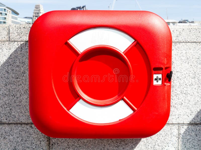 Red Life Preserver on Tile Wall. Stock Image - Image of survival, guard ...