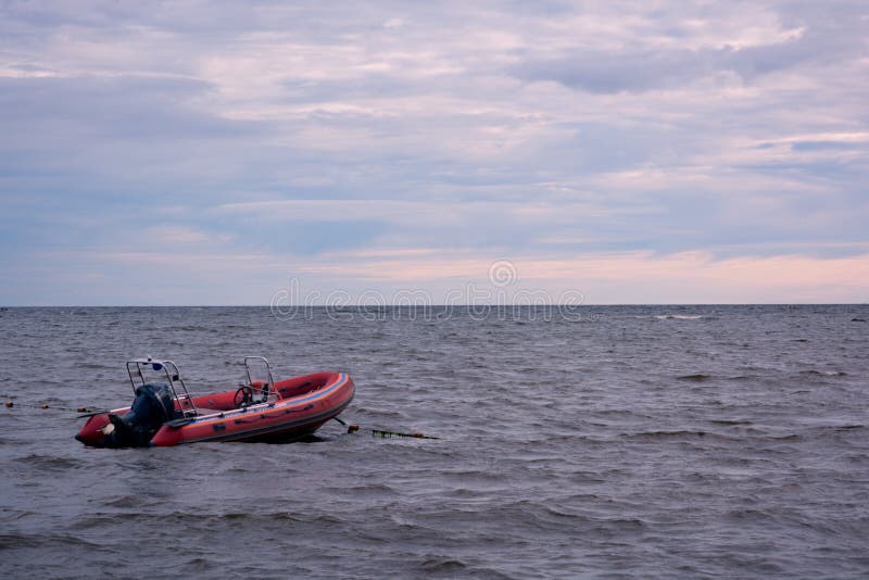Red lifeboat in water editorial stock image. Image of ocean - 98660429