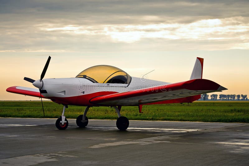 Red Light Aircraft in Sunrise Light Stock Photo - Image of aeroplane ...