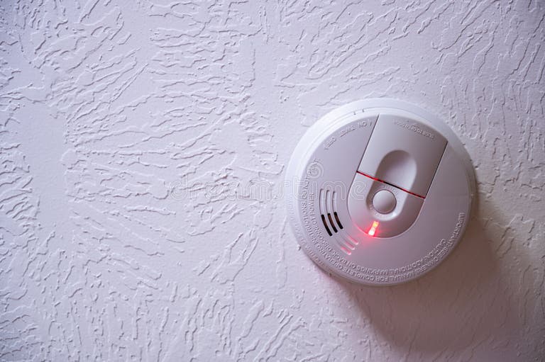 Red Light Batter Indicator on a Smoke Detector Mounted on a Ceiling ...