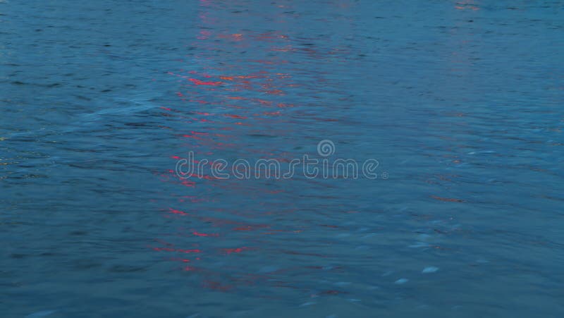 Red Light on Blue Water Surface Stock Image - Image of relax, colorful ...