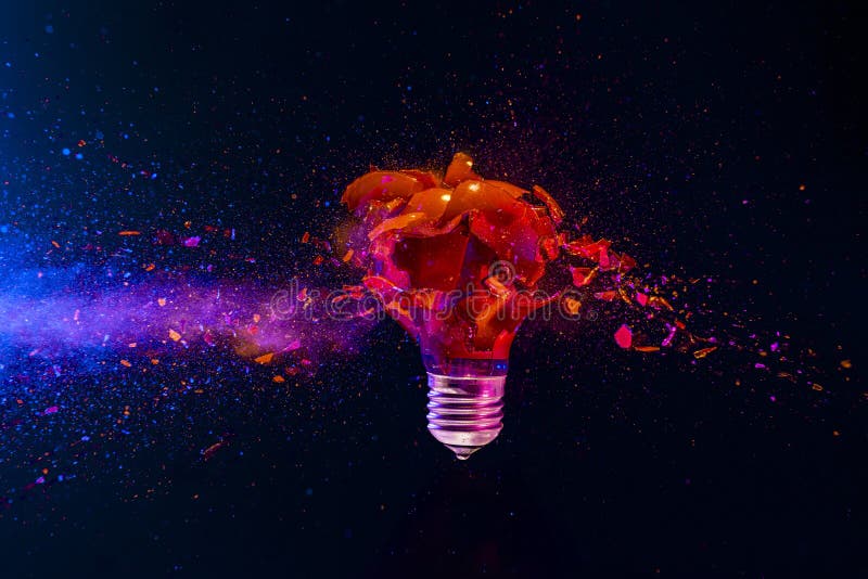 Red Light Bulb Exploding with Colorful Powder on Dark Background Stock ...