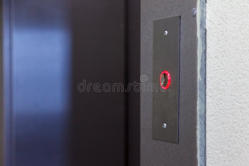 Red Light on the Elevator Button. Button for Calling the Elevator in an ...