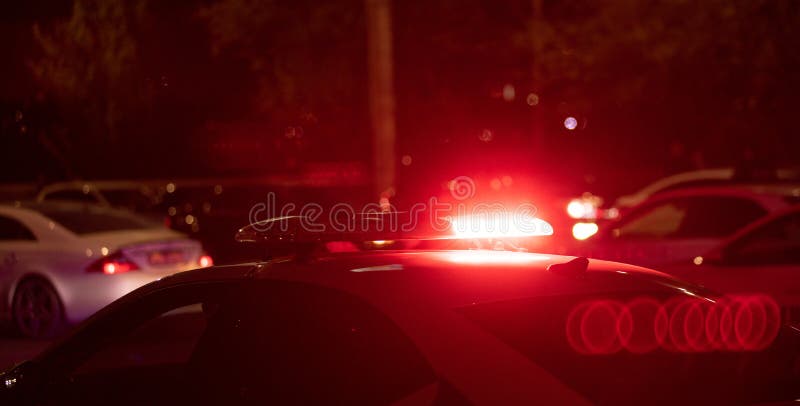 Red Light Flasher. Police Car at Night Time in the City Stock Photo ...