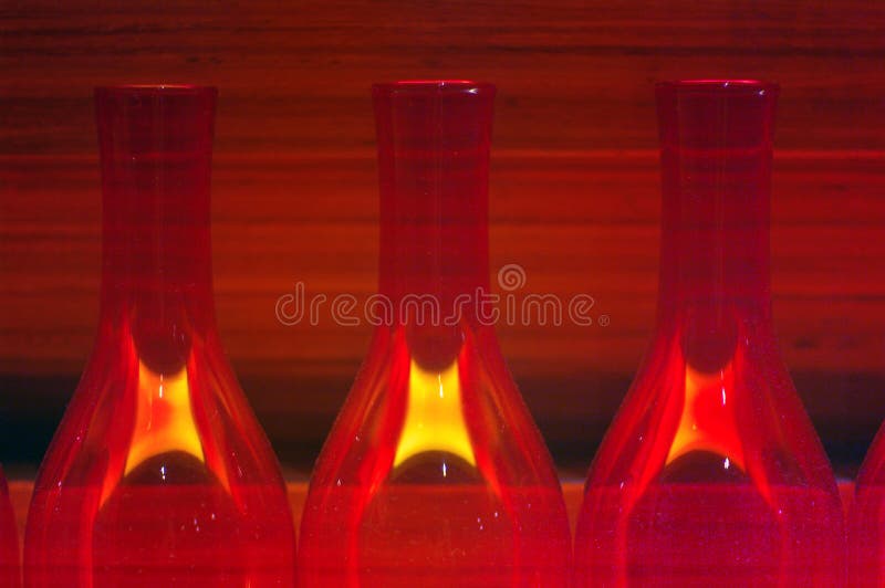 Red Light Illuminated Glass Bottles Abstract Background Stock Photo ...