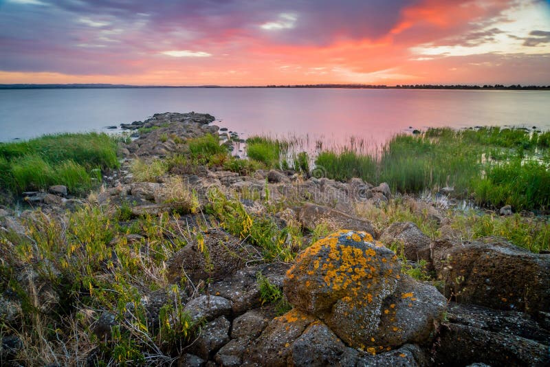 Red Light, Rocks and Lake for a Long Exposure Shot of Australia Stock ...