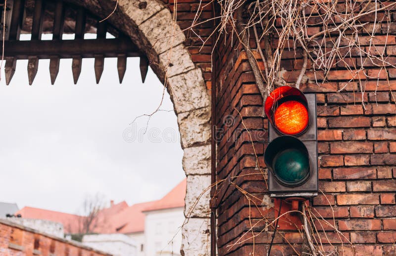 Red Light in Semaphore on Old Town Background. Traffic Lights Over ...