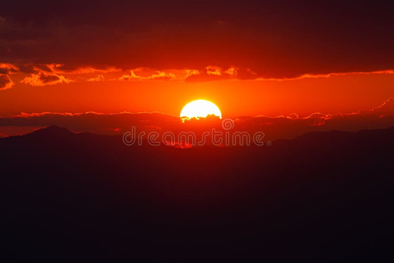 Red Light from Sunset Behind Cloudy Sky Stock Image - Image of dark ...