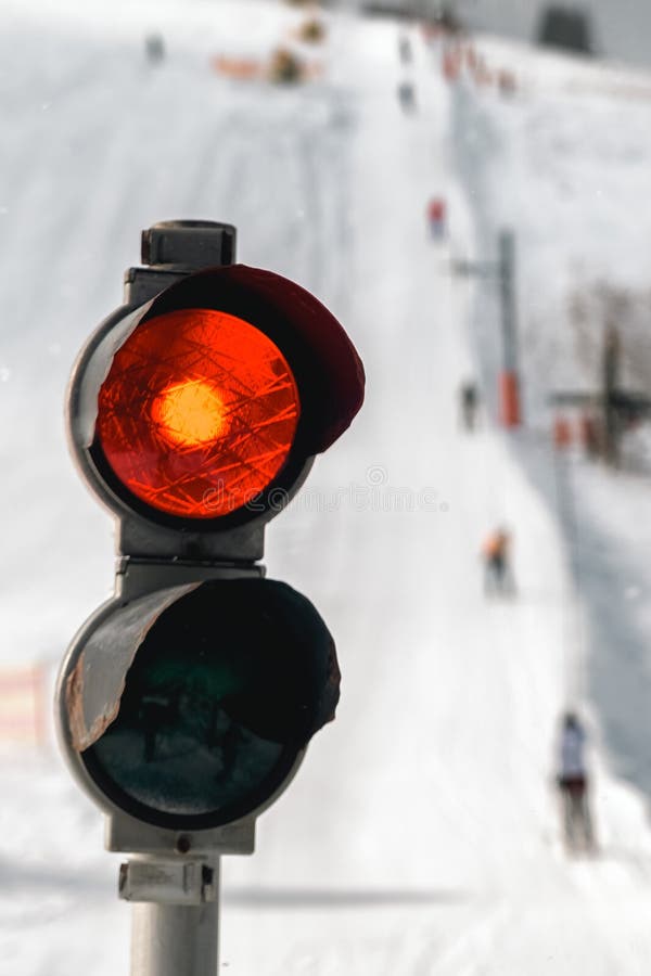 Red Light on Traffic Light on Slope with Ski Lift Stock Image - Image ...