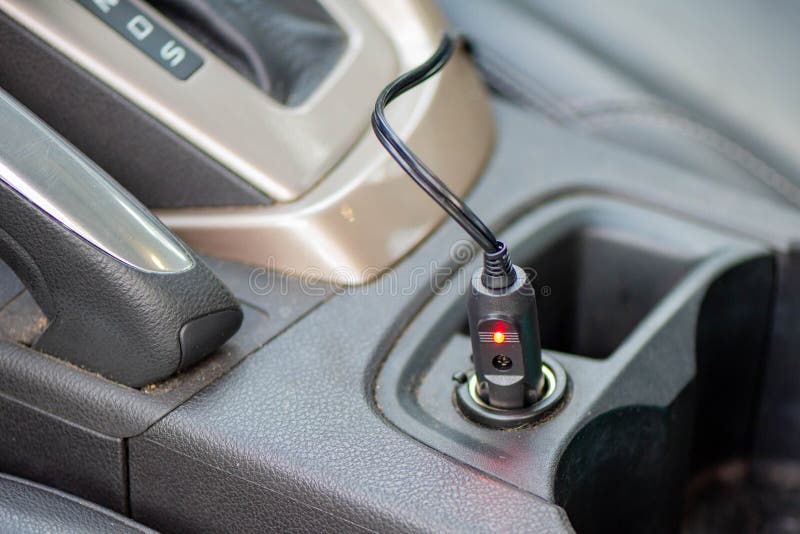 Red Light on a 12V Plug in an Automotive Cigarette Lighter Stock Photo ...