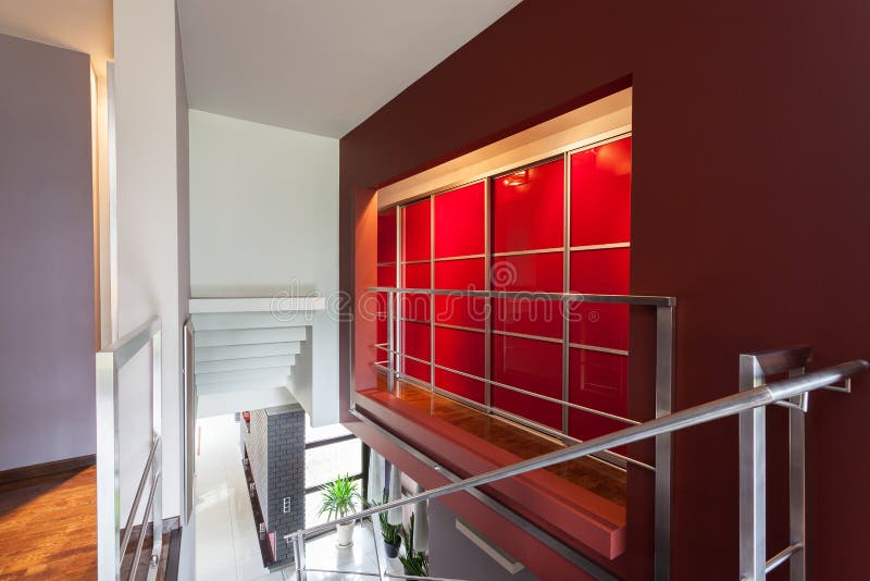 Red Lighted Wall in Modern House Stock Image - Image of railing ...