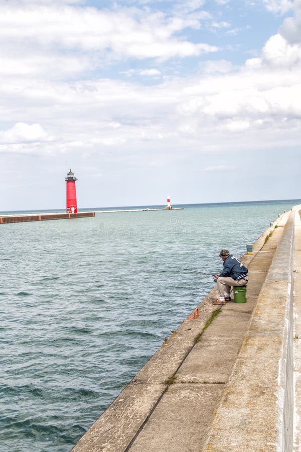 Red Lighthouse by the Edge of the Sea Editorial Photography - Image of ...