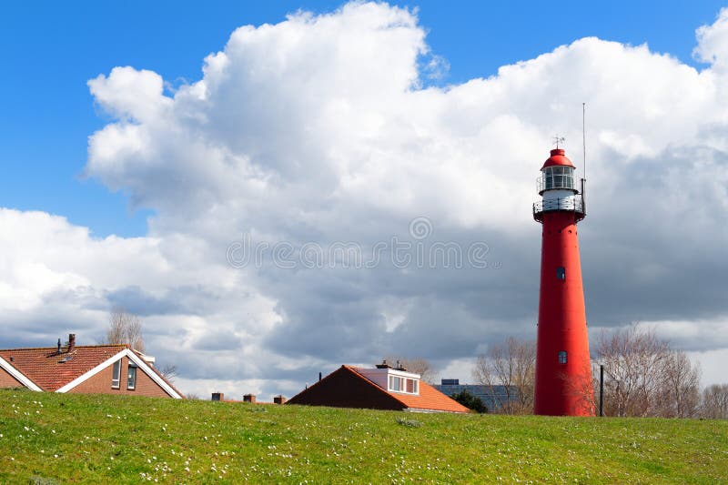 Red lighthouse in Holland stock photo. Image of famous - 315940802