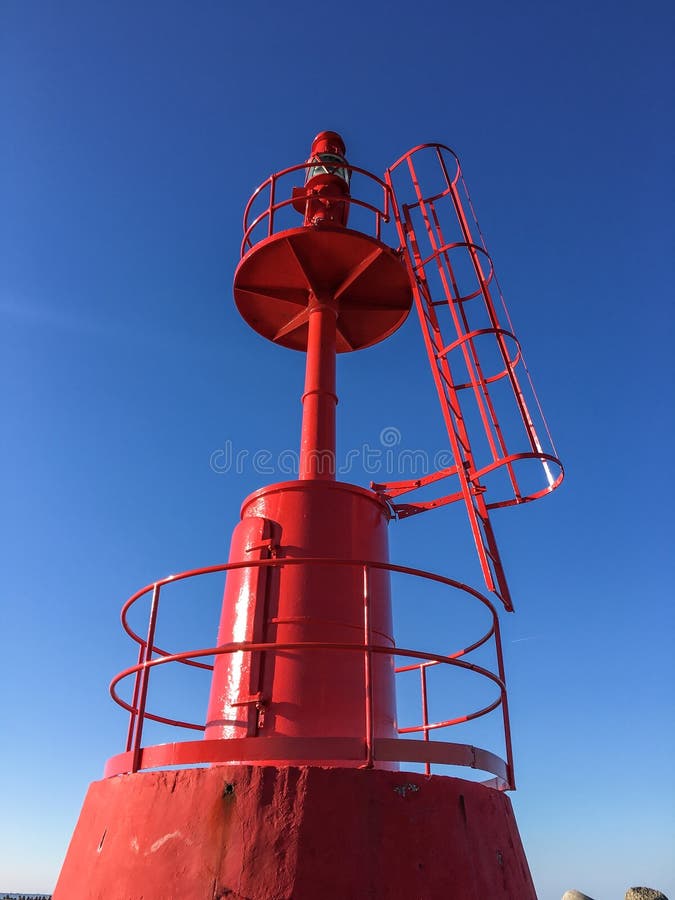 Red Lighthouse Inside at Port with Blue Sky Stock Photo - Image of ...