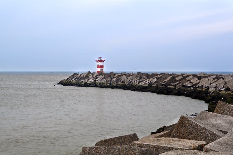 Red Lighthouse on North Sea Stock Image - Image of netherlands, north ...