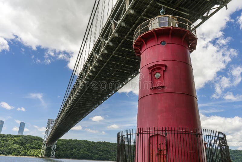 Red Lighthouse Under a Bridge Stock Image - Image of famous, lighthouse ...