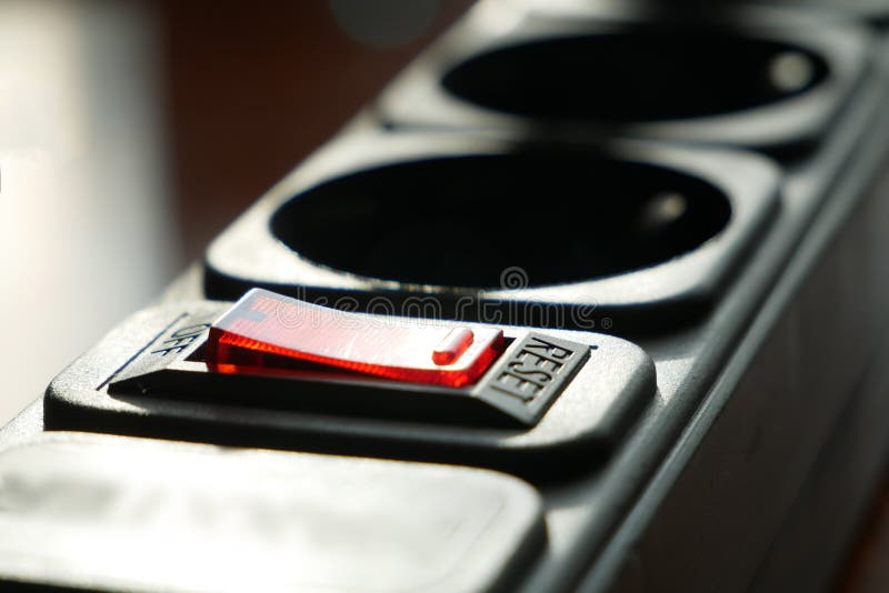 Red Lighting Outlet Switch on Black Electric Extension Cord, Closeup ...