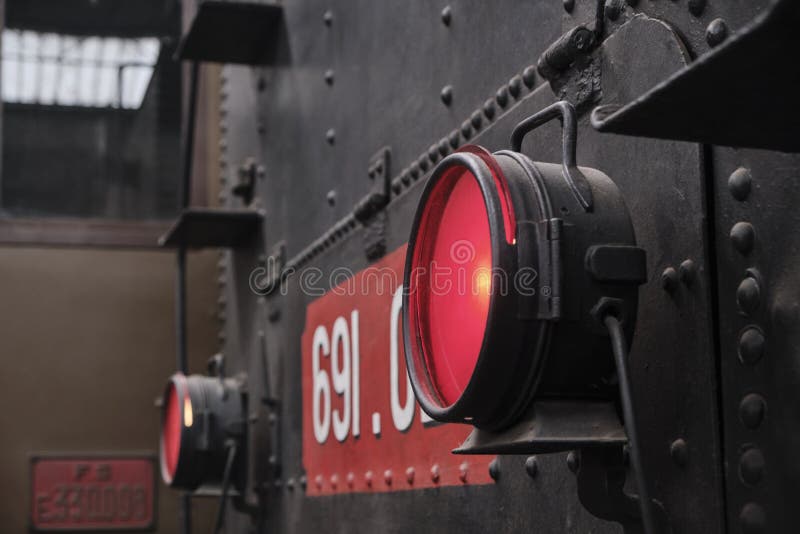 Red Lighting Steam Locomotive in a Old Train Station Stock Image ...