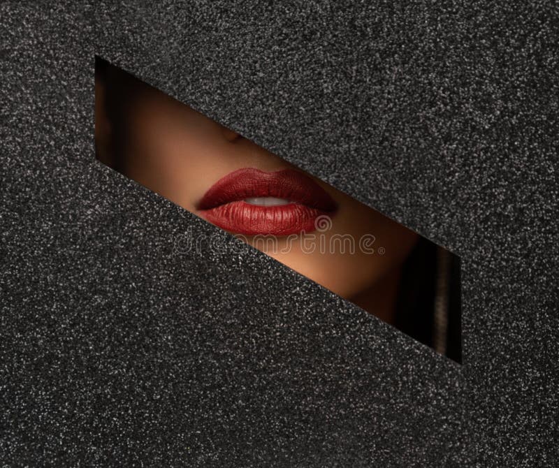 Red Lips Peep through a Hole in Shiny Black Paper. Stock Photo - Image ...