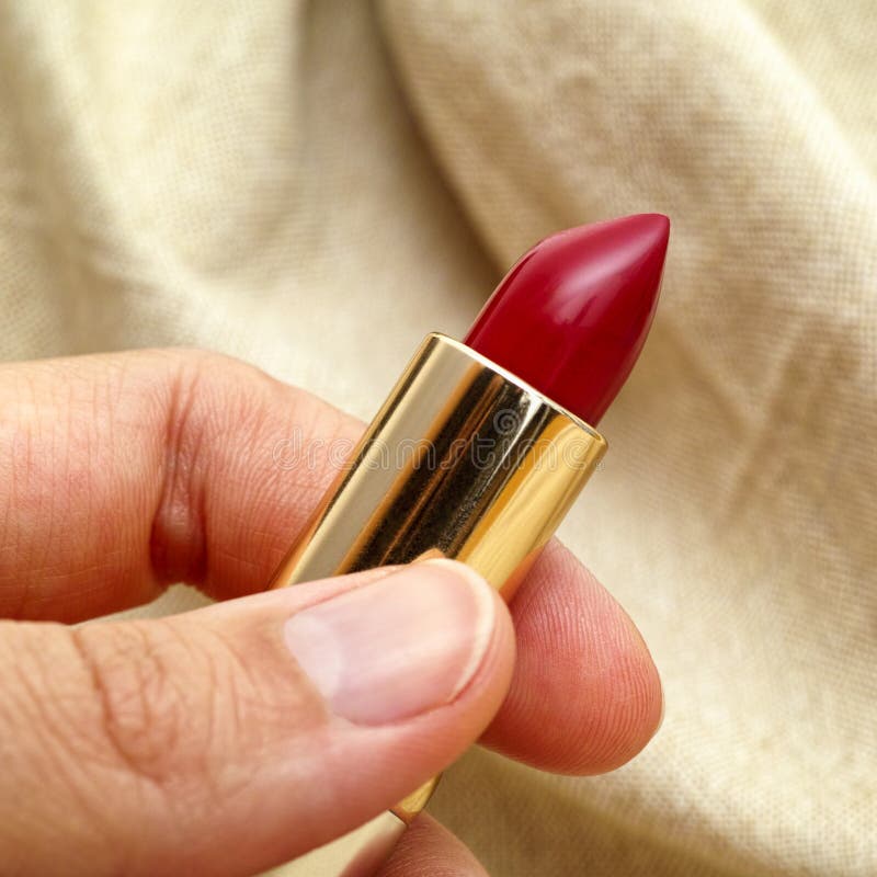 Red Lipstick in Woman Hand. Stock Photo - Image of hand, cosmetics ...