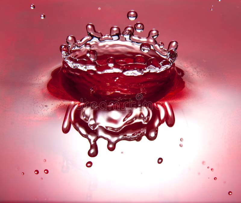Red liquid crown stock image. Image of drop, beauty, healthy - 6803369