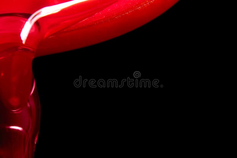 Red Liquid Flowing Macro is on Black Background Stock Photo - Image of ...