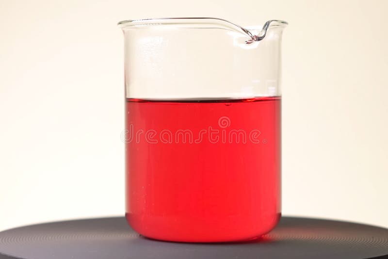 Red Liquid in Glass Glass. Chemical Experiments Stock Image - Image of ...