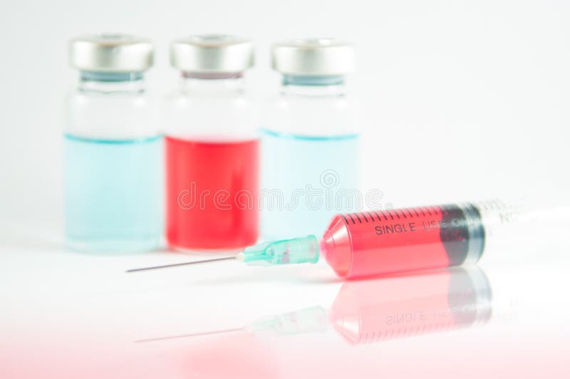Red Liquid in Injection Syringe and Vials Stock Image - Image of ...