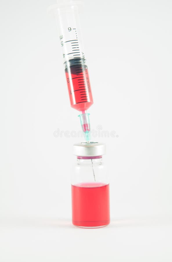 Red Liquid in Injection Syringe and Vials Background Stock Image ...