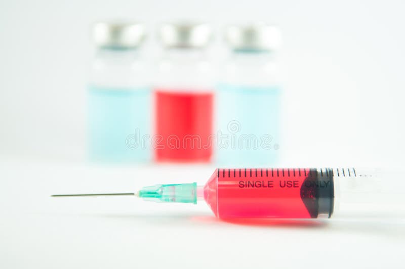 Red Liquid in Injection Syringe and Vials Stock Image - Image of ...