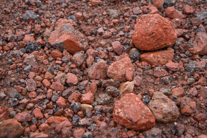 Red Little Stones on the Road Closeup Stock Image - Image of climbing ...