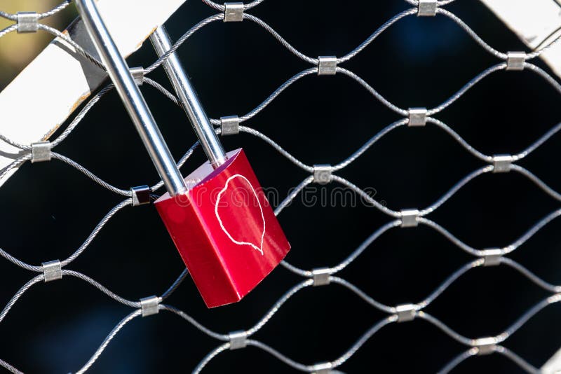 Red Lock with Drawing Heart Locked on Steel Net Cage Stock Image ...