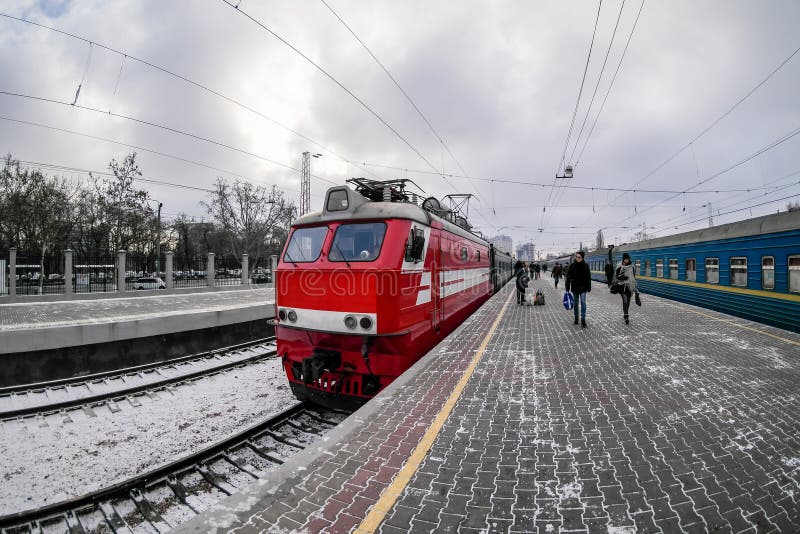 Red Locomotive on Train Station Platform in the Winter Editorial Stock ...