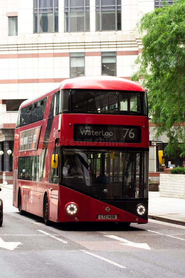 A Red London Double Decker Electric Bus on Piccadilly Circus, London ...