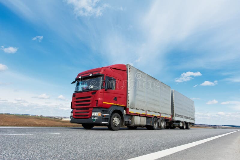 Red Lorry with Grey Trailer Over Blue Sky Stock Image - Image of ...