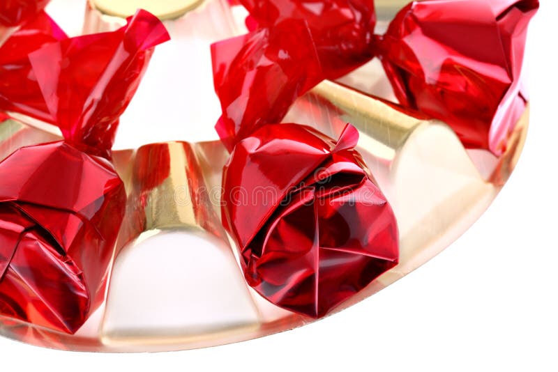 Red Luxury Sweets in Zig-zag Row Isolated on White Stock Image - Image ...