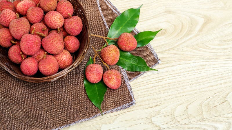 Red Lychee Fruit on a Wooden Table Stock Image - Image of freshness ...