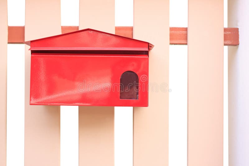 Red Mail Box Hanging on Fence Stock Image - Image of delivering, blue ...