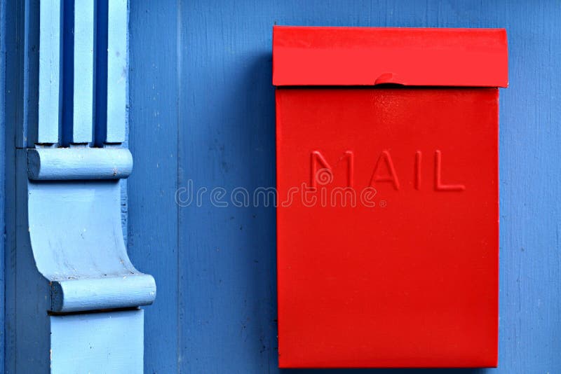 Red Mailbox And Blue Column Stock Photo - Image of column, wall: 3930612