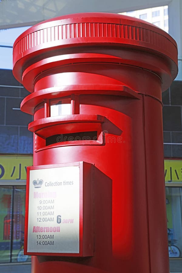 Red mailbox is in a park editorial photo. Image of aging - 369391616