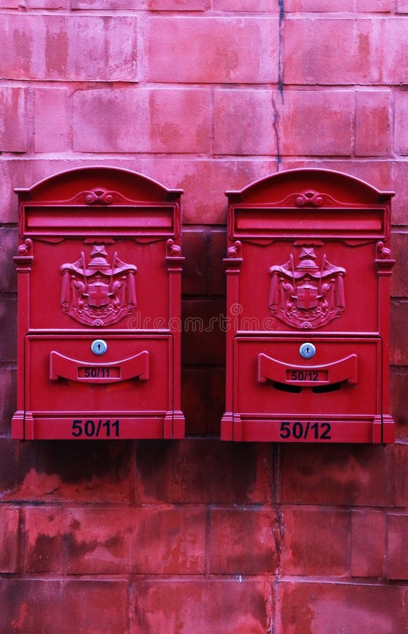 Red mailboxes stock photo. Image of redmailbox, brick - 92320018