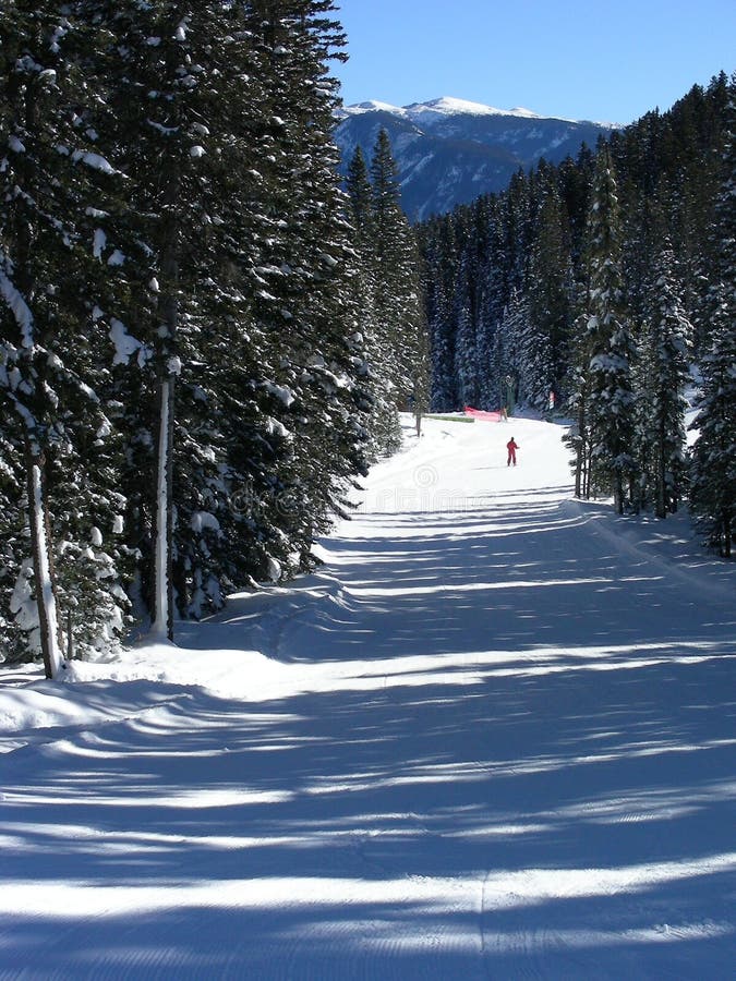 Red Man Skiing stock photo. Image of slope, colorado - 12193672