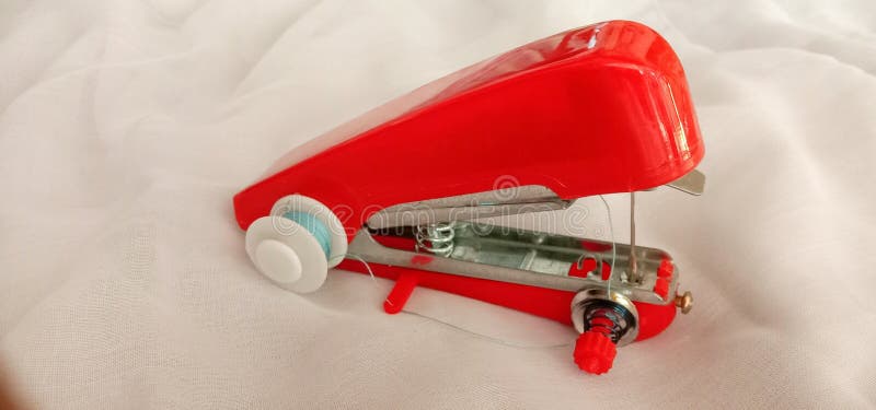 Red Manual Sewing Machine on White Cloth Stock Image - Image of glasses ...