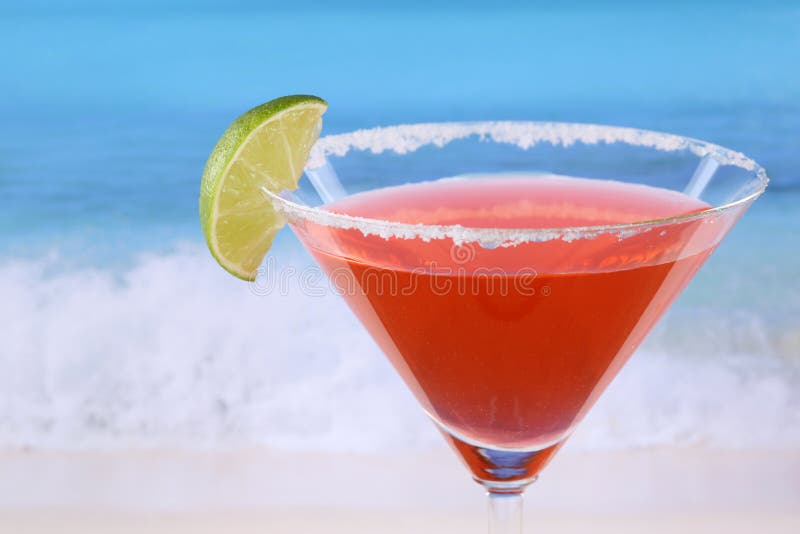Red Martini Cocktail With A Lime On The Beach Stock Photo - Image of ...