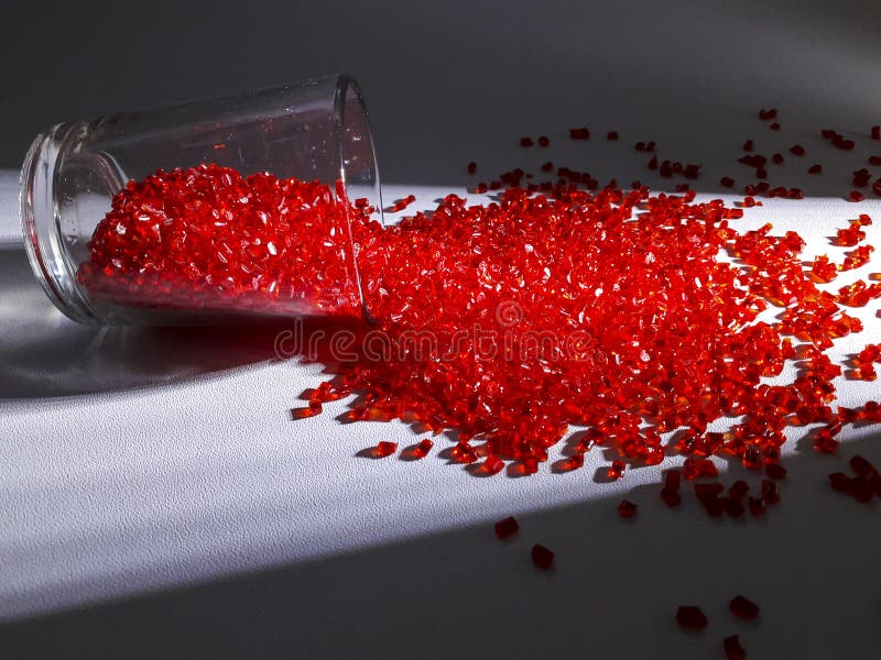 Red masterbatch granule stock photo. Image of grain - 319588640