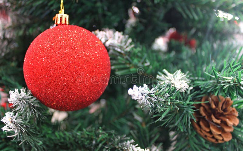 Red Matt Christmas Ball and Pine Cone on Artificial Tree Stock Image ...
