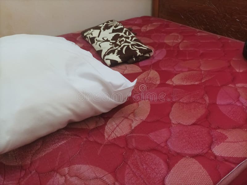 Close Up of the Red Mattress and White Pillow Stock Image - Image of ...