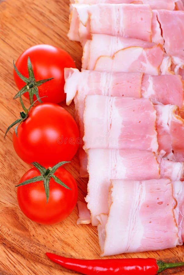 Red Meat Bacon Rolled with Tomato Stock Image - Image of meaty, macro ...